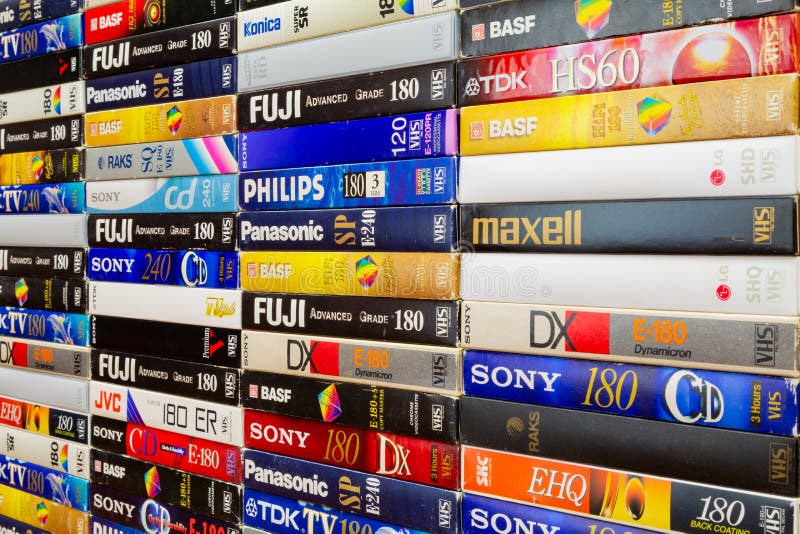 Colorful Plastic and Paper Cases with VHS Videotapes Editorial Image ...