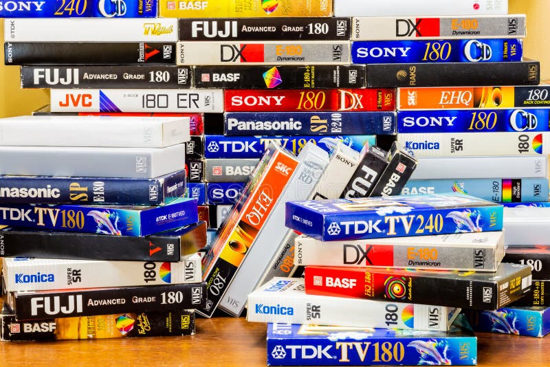 Colorful Plastic and Paper Cases with VHS Videotapes Editorial Image ...