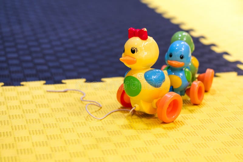 Pull Toy Duck Accompanied by Adorable Two Little Ducks on a Shelf for ...