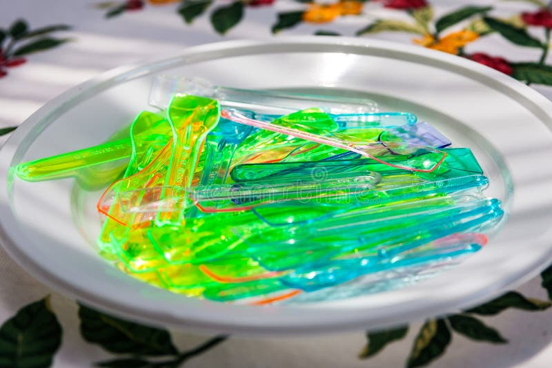Colorful plastic spoons stock photo. Image of colourful - 305873876