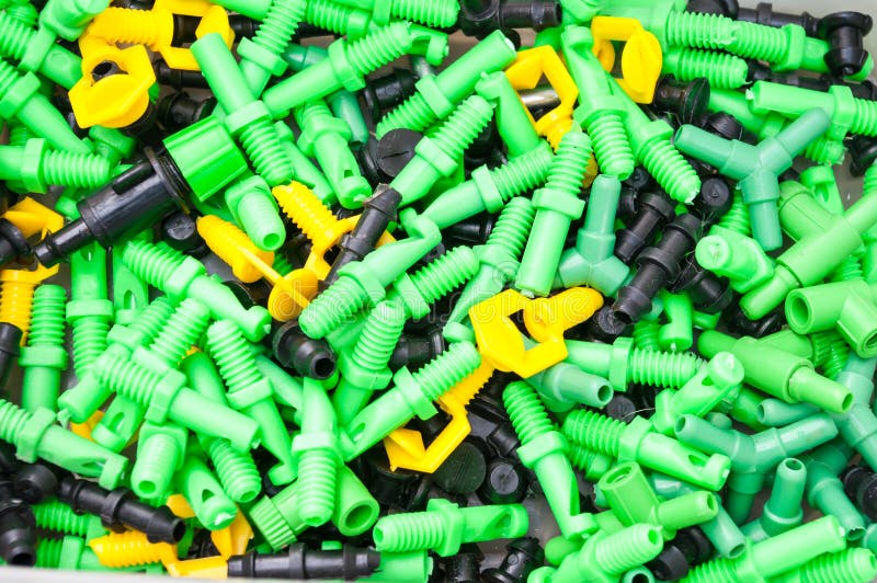 Colorful Plastic Sprinkler Heads Stock Photo - Image of watering ...