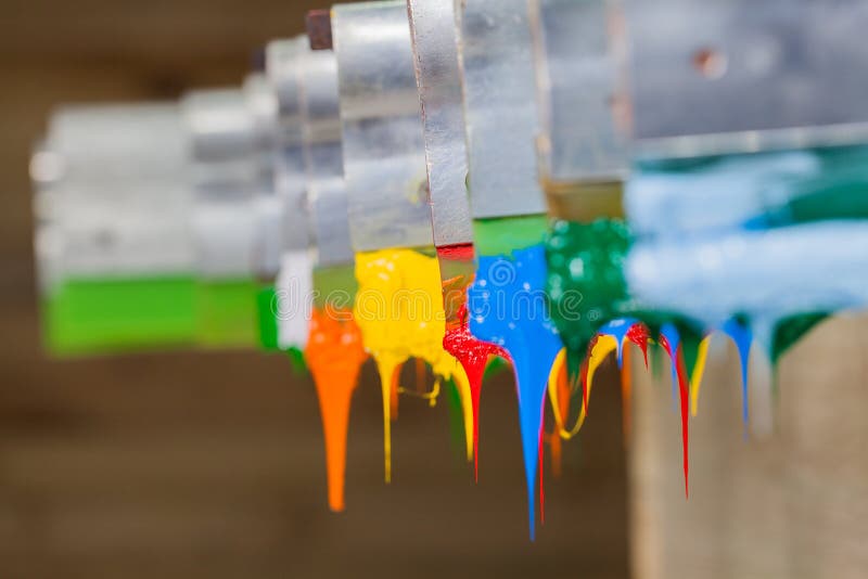 Colors Dripping from the Rubber Print Handle Stock Image - Image of ...