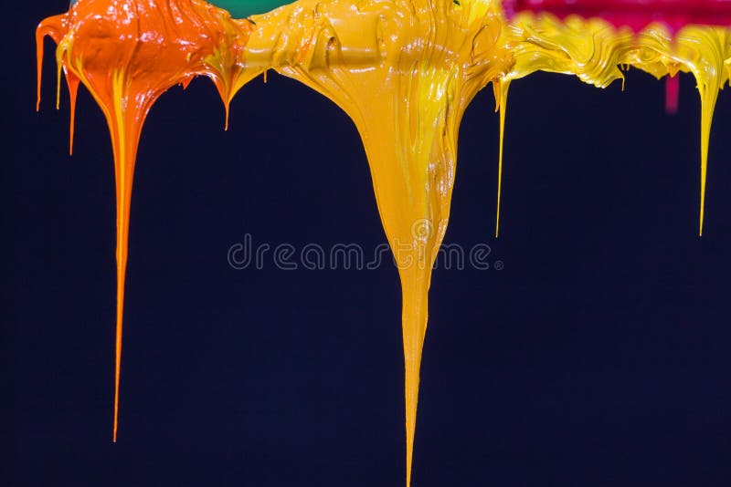 Colors Dripping from the Rubber Print Handle Stock Image - Image of ...