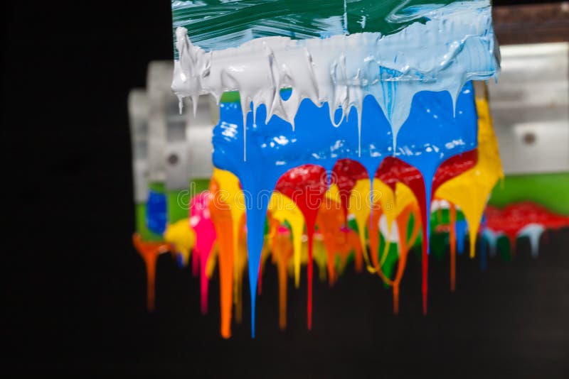 Colors Dripping from the Rubber Print Handle Stock Photo - Image of ...