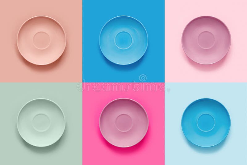 Colorful Plates on Bright Table. Monochrome Minimalistic Image in ...