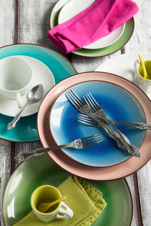 Colorful plates and cups stock photo. Image of ceramic - 31529966