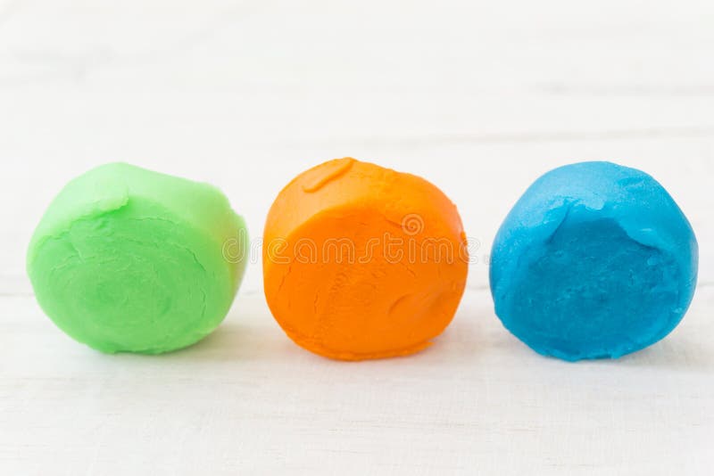 Colorful Playdough on Wooden Table. Stock Photo - Image of clay, blue ...