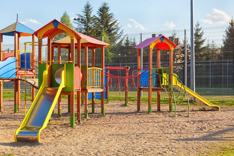 Colorful Playground in the Park Stock Image - Image of slides ...