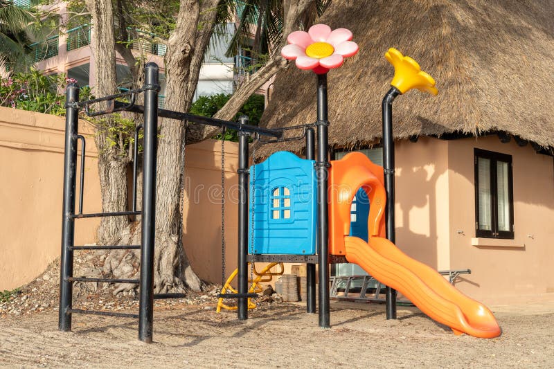 Colorful Playground on the Sand in the Garden Stock Photo - Image of ...