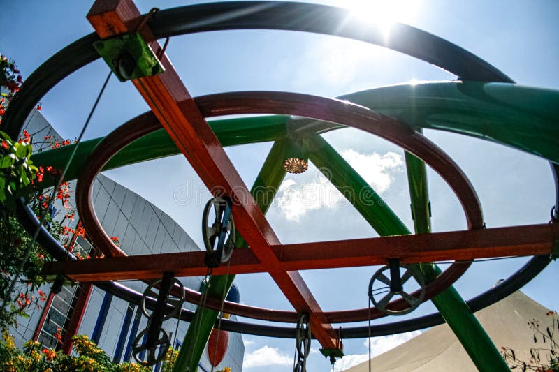 Colorful Playground Structure Featuring Circular Design and Gears Under ...