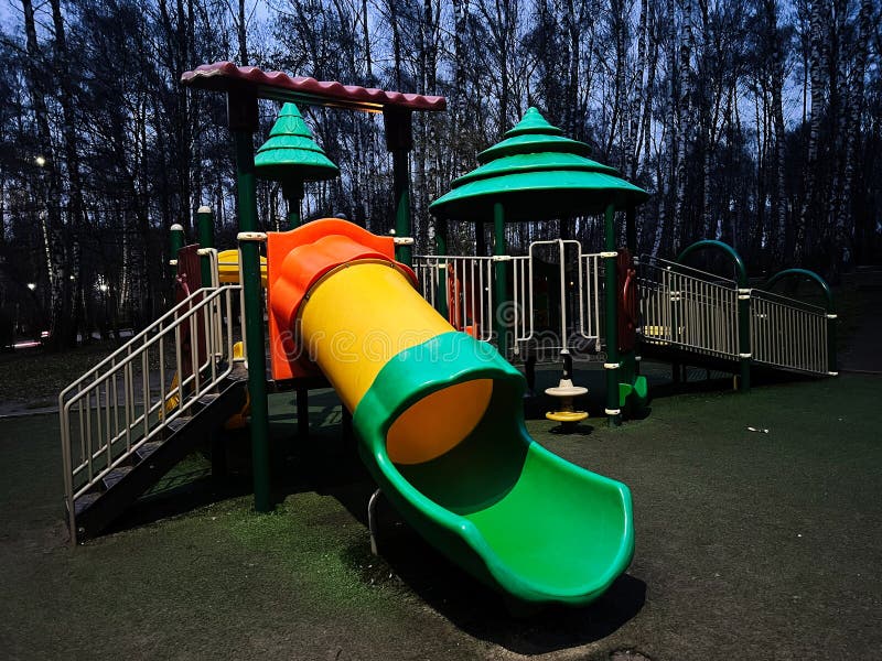 Colorful Playground Structure with Slides and Climbing Areas in a ...