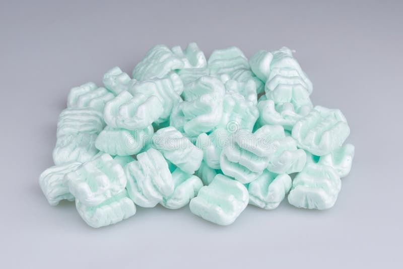 Colorful Polystyrene Foam Chips on a White Background. Stock Photo ...