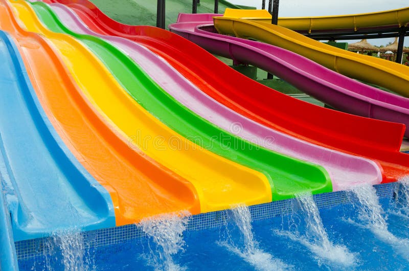 Colorful pool slides stock photo. Image of aqua, slide - 34566988