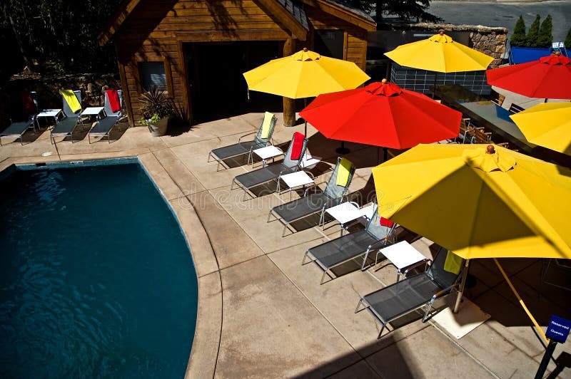 Colorful Pool Umbrellas stock image. Image of water, outdoor - 914597