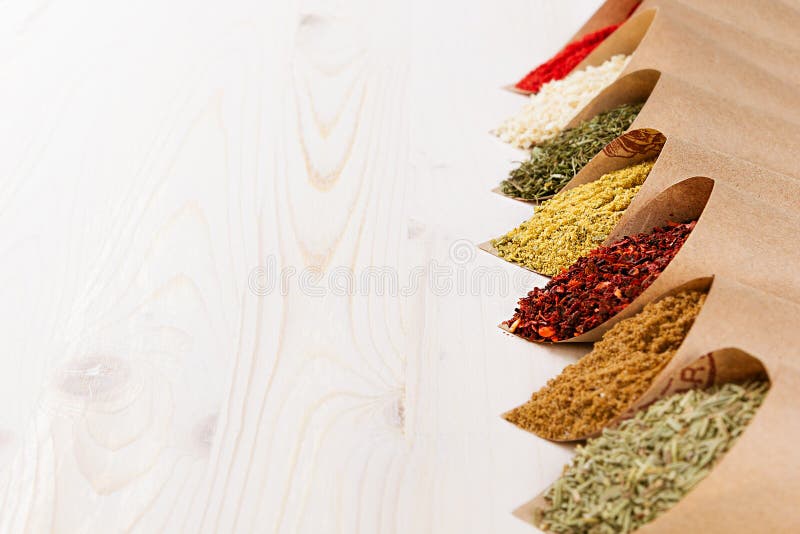 Colorful Powder Seasoning Pattern on White Wooden Board with Copy Space ...