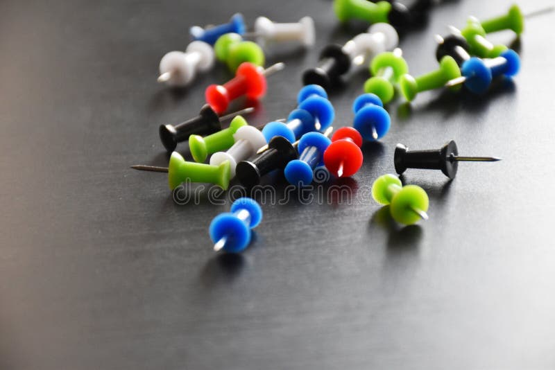 Colorful Punch Pins Drawing Pins on Black and White Background Stock ...