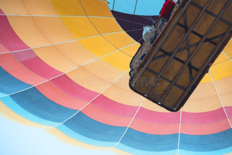 Colorful Rainbow Patterned Hot Air Balloon Rising Up Stock Image ...