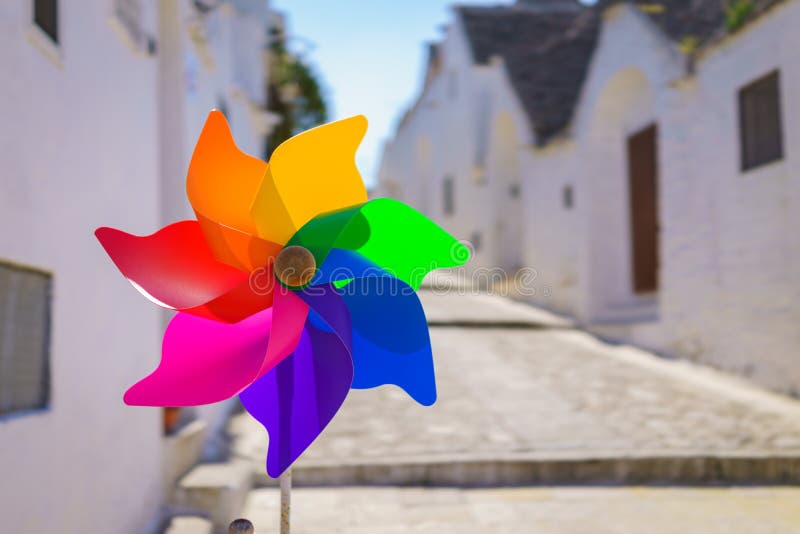 Colorful Rainbow Pinwheel in Sun Shine Summer Day. Stock Photo - Image ...
