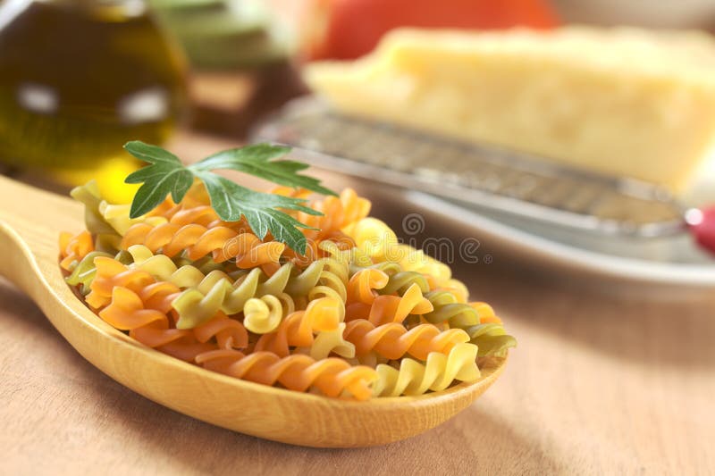 Colorful Raw Fusilli Pasta stock image. Image of herb - 19170909