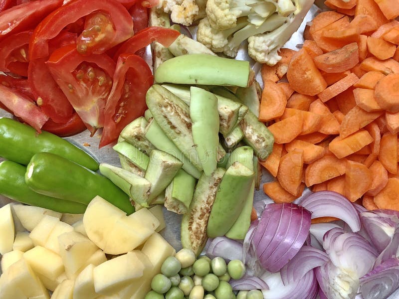 Colorful Raw Vegetables Chopped into Pieces in a Plate Stock Photo ...
