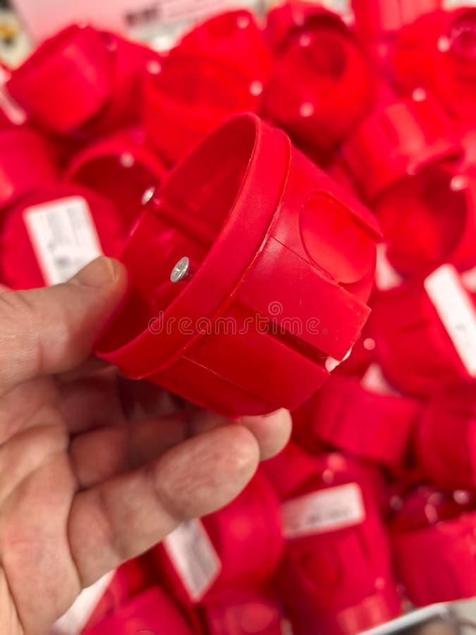 Colorful Red Objects on Display in a Dynamic Crafting Space with ...