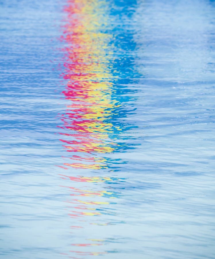 Colorful Reflection on the Water with a Street Lamp Stock Photo - Image ...