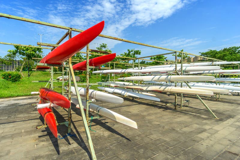 Colorful Rental Kayaks Stored on a Beach Stock Photo - Image of water ...