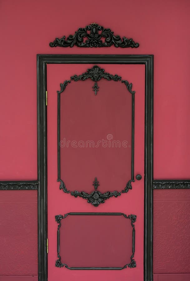 Old Dramatic Red Doors on the Background of the Wall. Stock Image ...