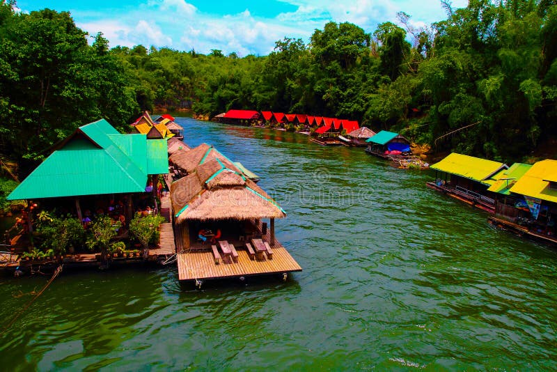 Colorful Riverside Boathouse Along the River Stock Photo - Image of ...