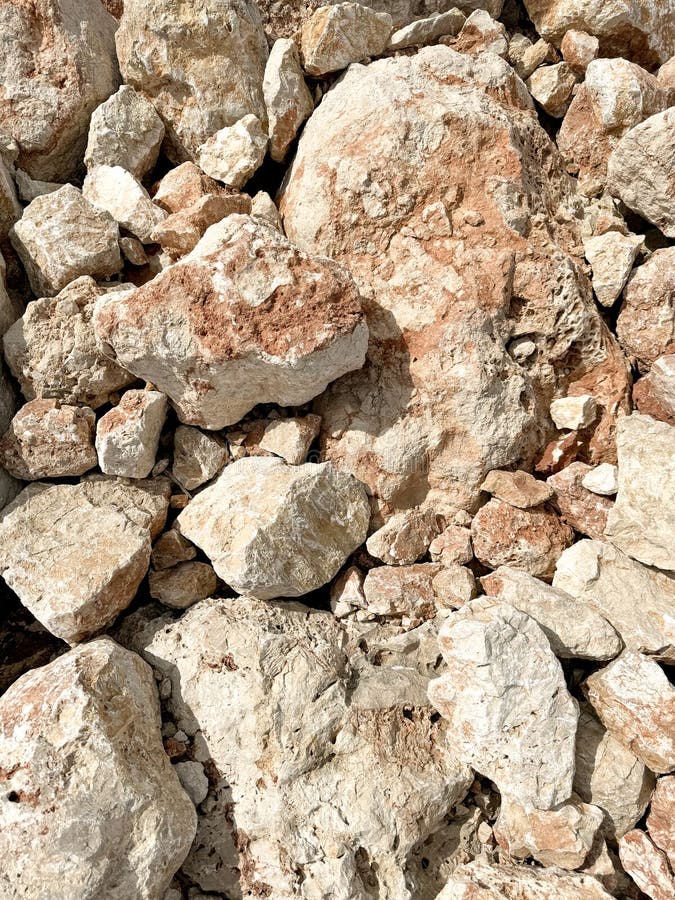 Varied Textures of Crushed Rock Aggregate in Bright Sunlight Near a ...