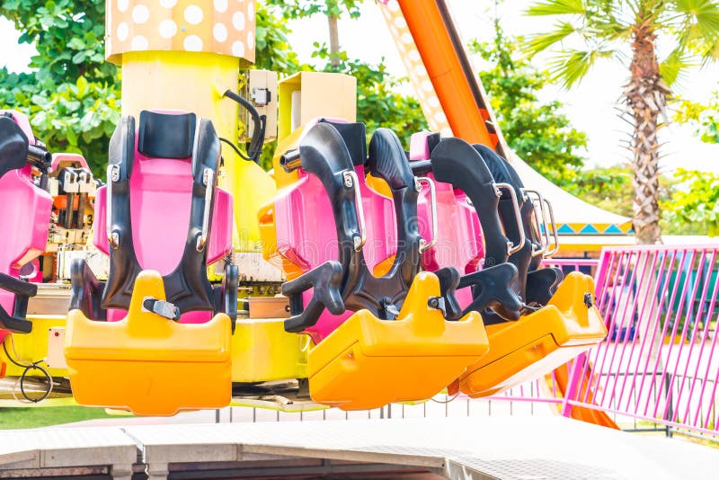 Colorful Roller Coaster Seats at Amusement Park Stock Photo - Image of ...