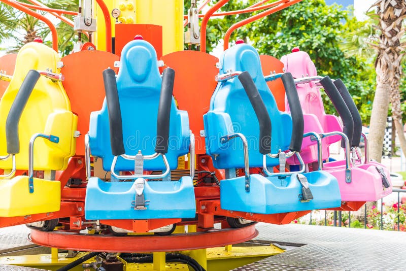 Colorful Roller Coaster Seats at Amusement Park Stock Image - Image of ...