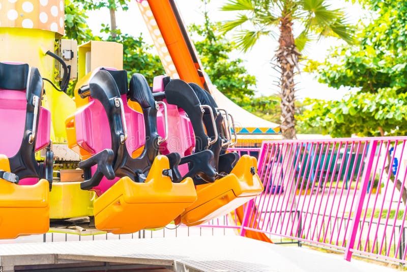 Colorful Roller Coaster Seats at Amusement Park Stock Image - Image of ...