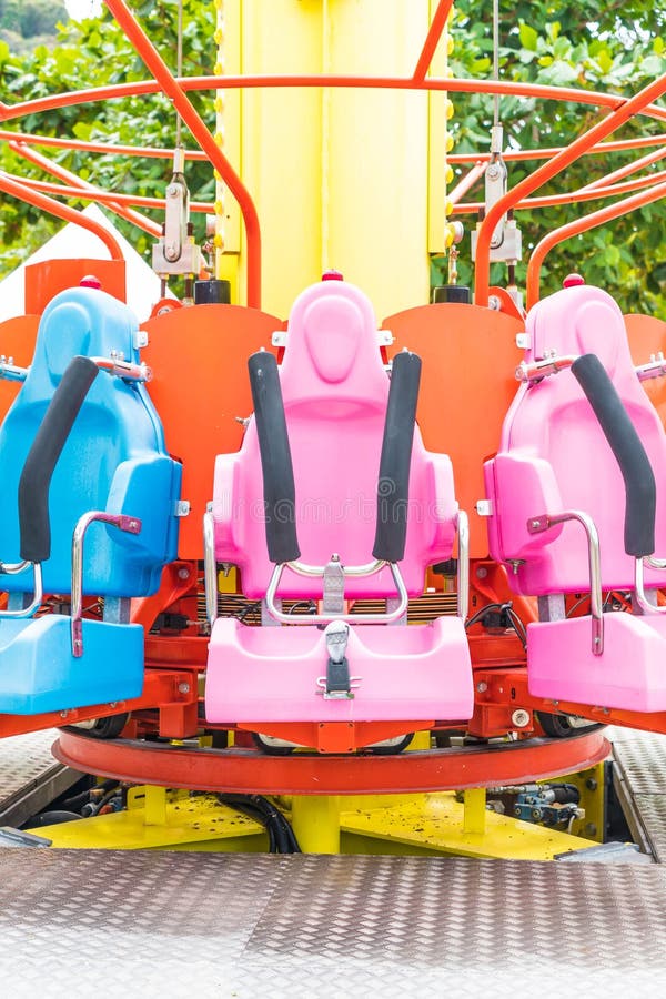 Colorful Roller Coaster Seats at Amusement Park Stock Photo - Image of ...