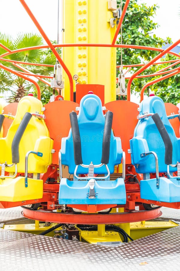 Colorful Roller Coaster Seats at Amusement Park Stock Photo - Image of ...