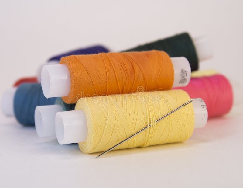 Colorful rolls of thread. stock image. Image of withrgb - 65988761