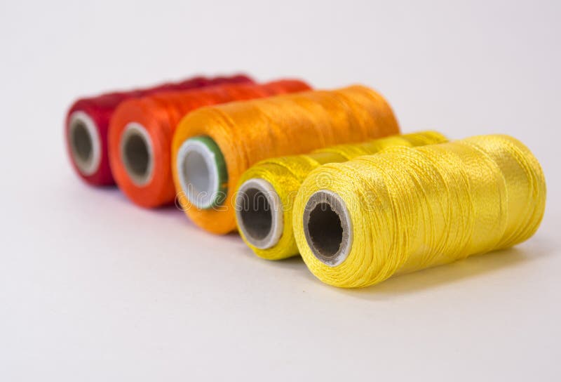 Colorful rolls of thread. stock image. Image of sewing - 65988951