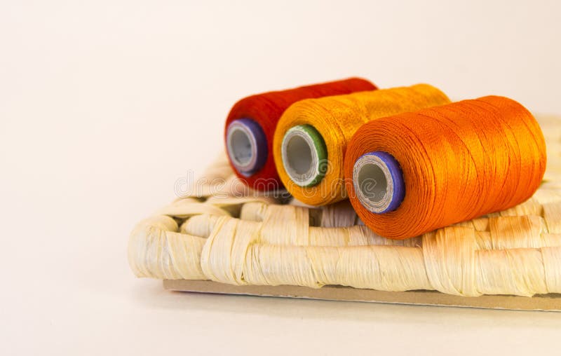 Colorful rolls of thread. stock image. Image of cmykcolors - 65989055