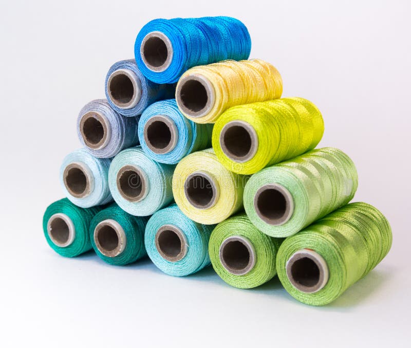 Colorful rolls of thread. stock image. Image of needles - 65989385