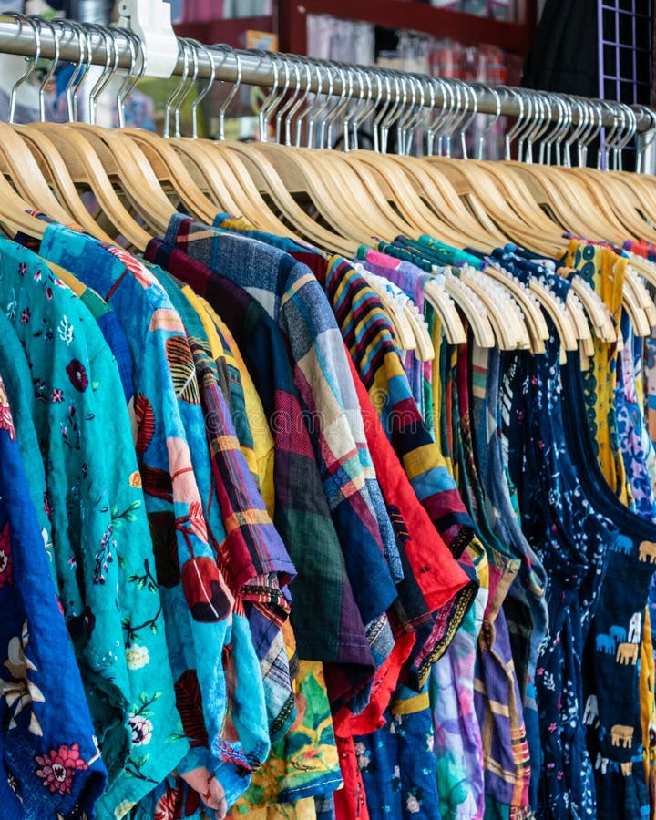 Colorful Row of Clothes on Hangers Stock Image - Image of shirt, hanger ...
