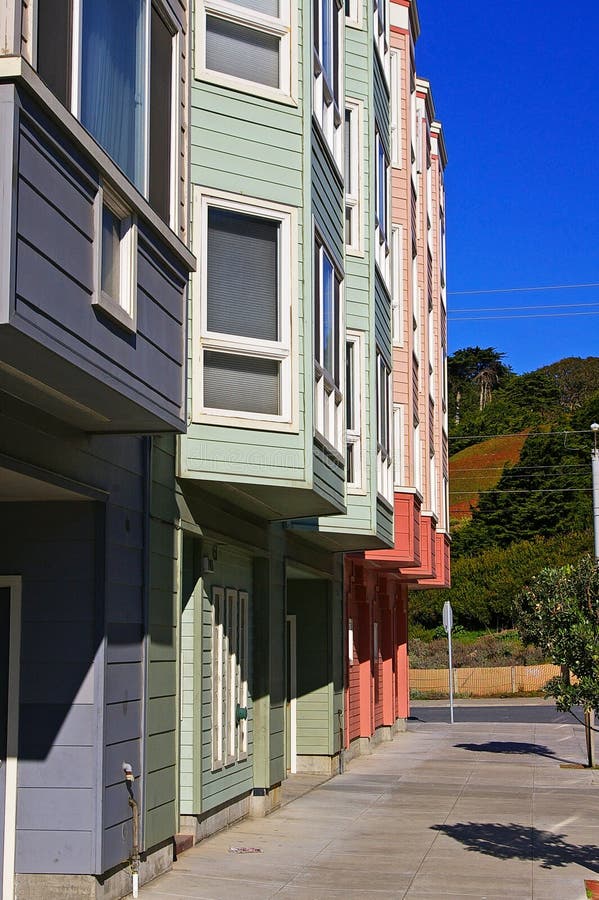 Colorful Row Of Modern Apartment Buildings Stock Photo - Image of ...