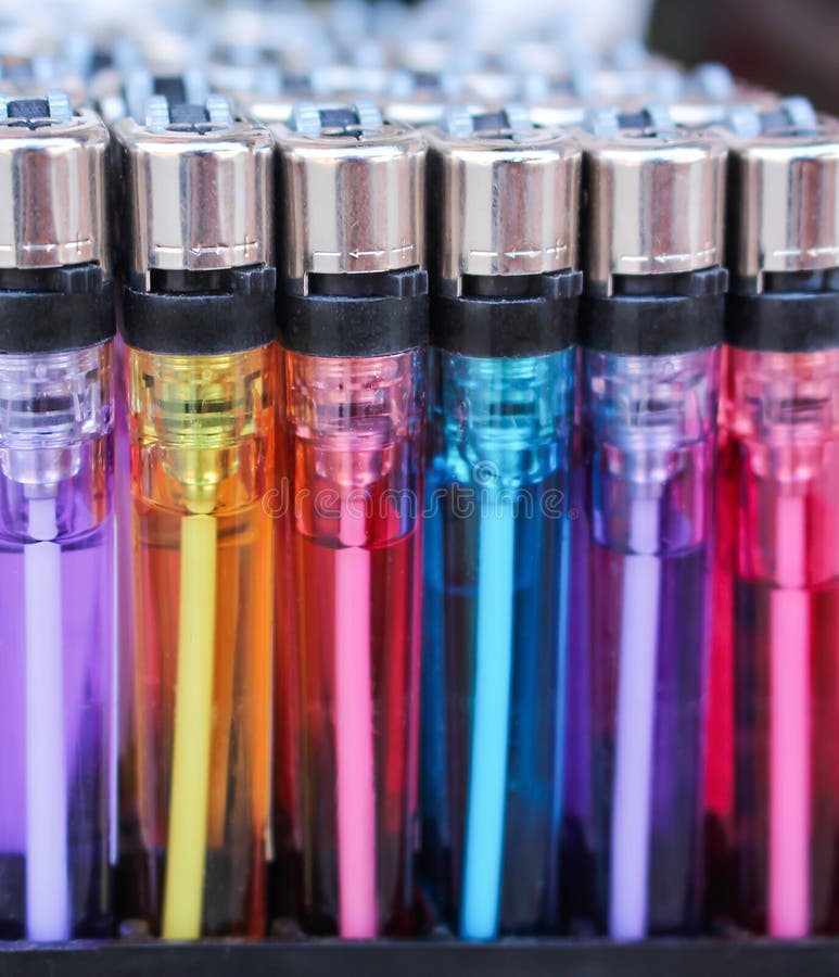 Colorful Row of Multicolored Gas Lighter in Black Package Stock Image ...