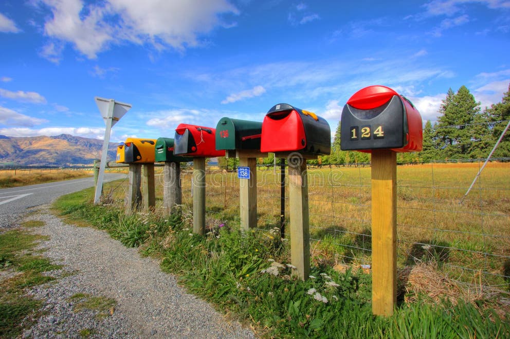 Colorful row of post boxes stock photo. Image of mailman - 9015918