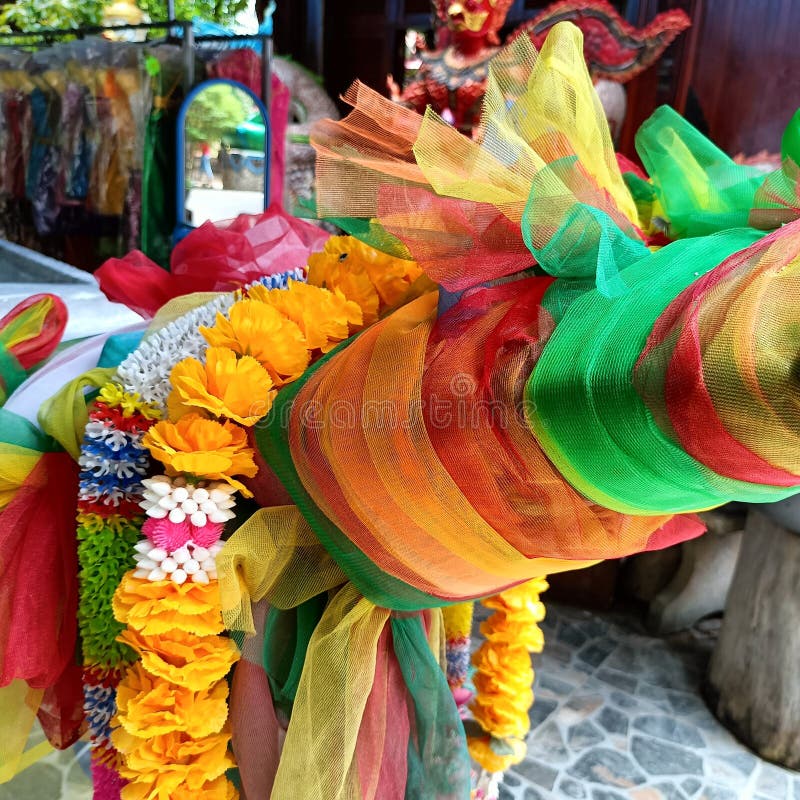 Colorful Satin Wrapped Around Sacred Objects at Temples in Thailand ...