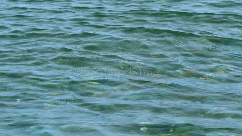 Colorful Sea Pebbles. Small Sea Foam Waves Breaking on a Pebble Beach ...