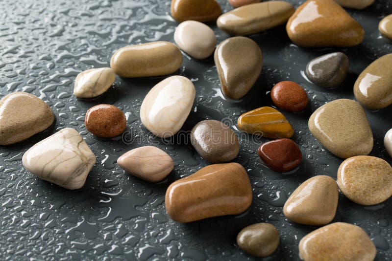 Pebbles and water stock photo. Image of closeup, ocean - 22381266