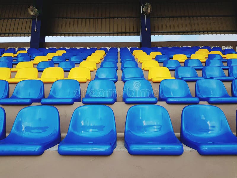 Colorful seats at stadium stock photo. Image of fans - 172603340