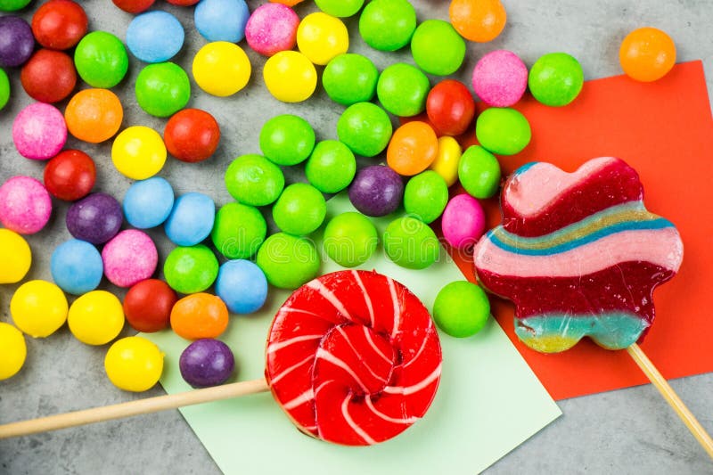 Colorful Selection of Candy Treats Laid Out on Multicolored Sticky ...