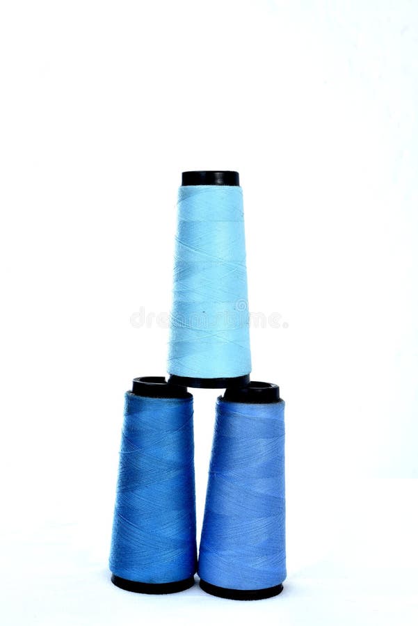 Colorful Sewing Thread Reels on White Background with Scissors Stock ...