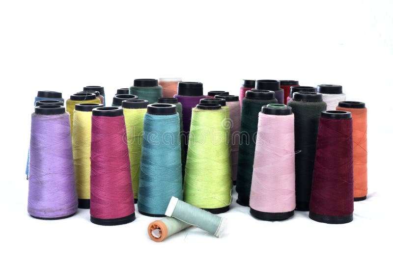 Colorful Sewing Thread Reels on White Background with Scissors Stock ...